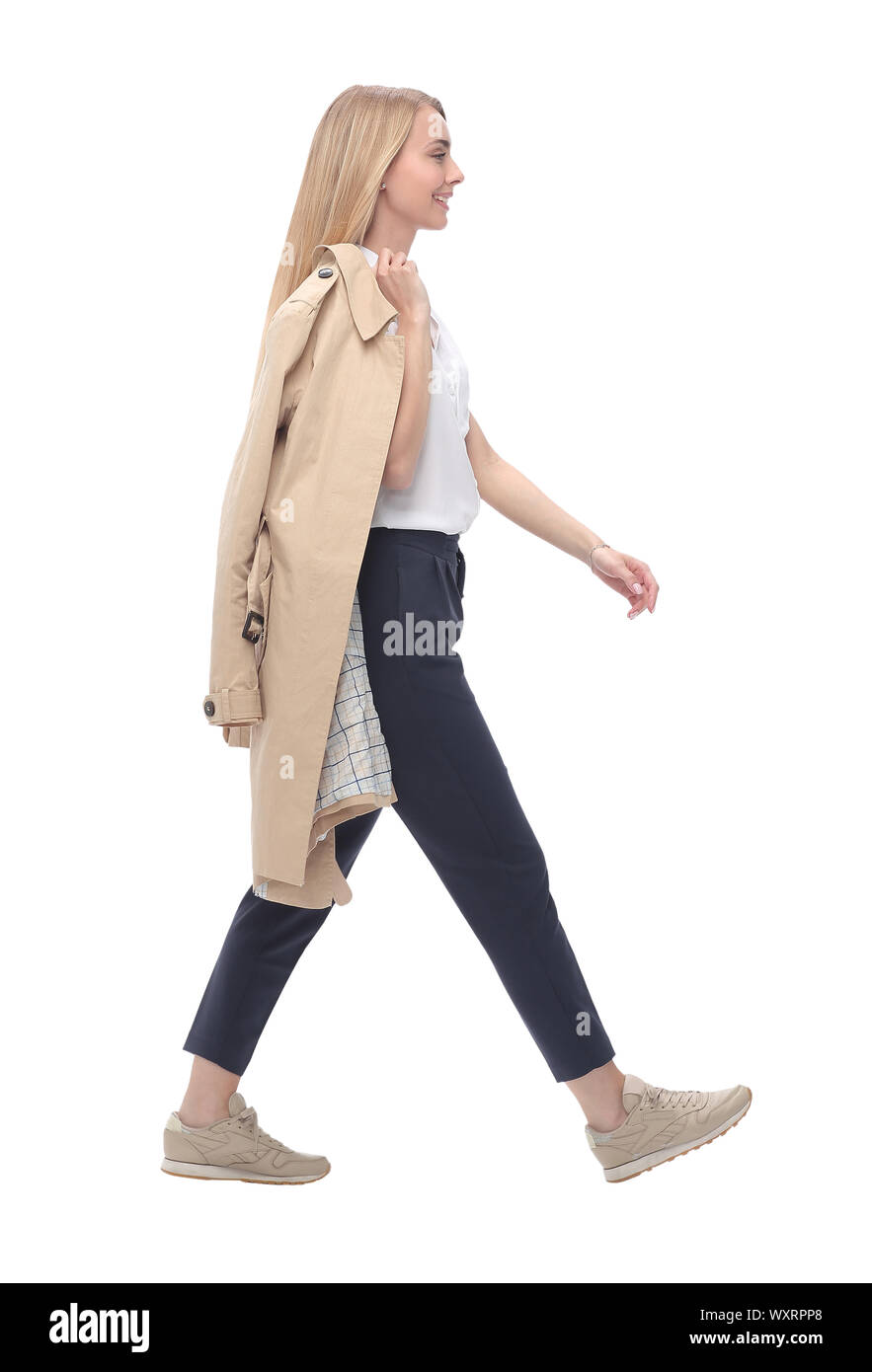 side view. a confident young woman steps forward Stock Photo - Alamy