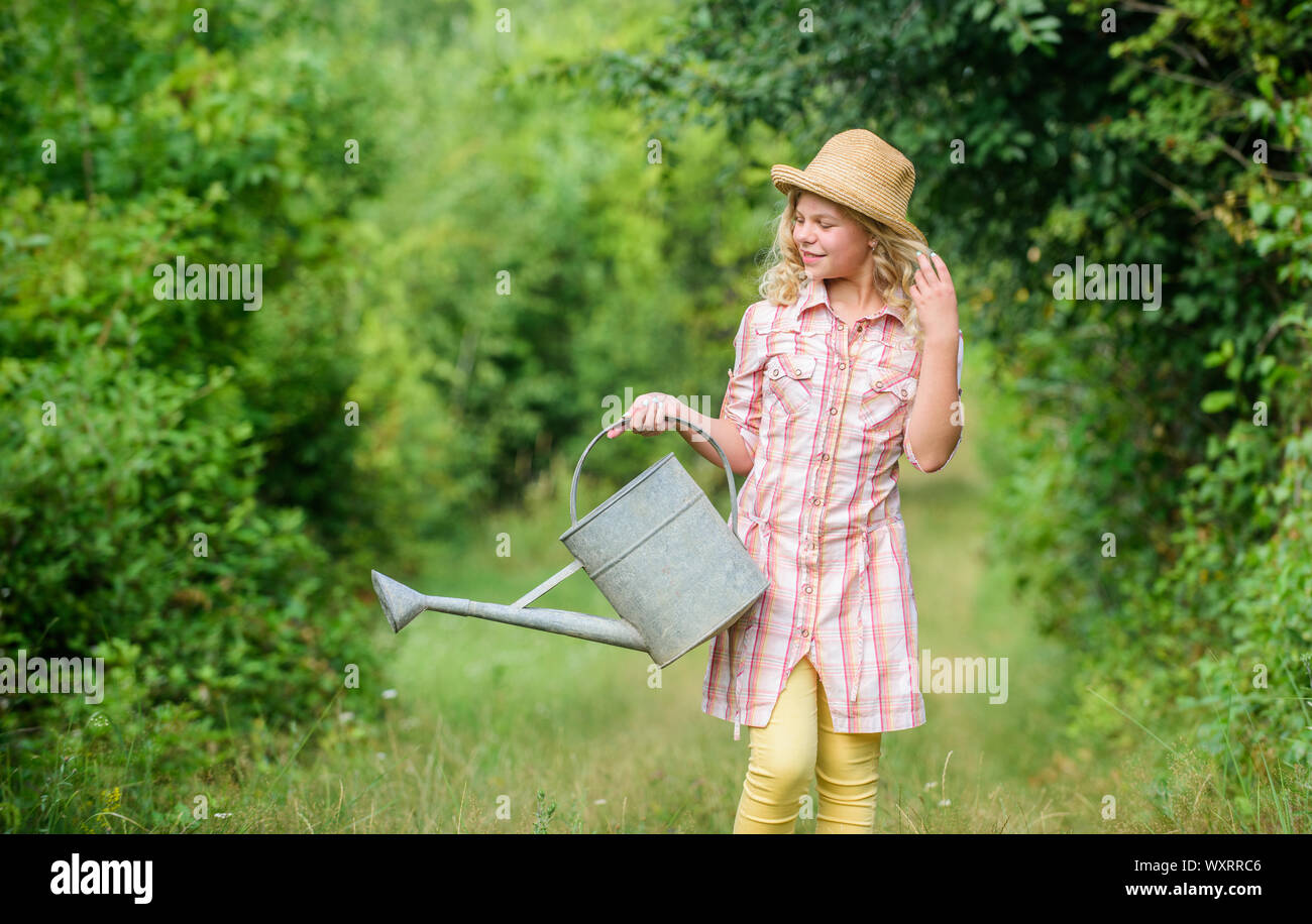 Watering tools. Girl child hold watering can. Spring gardening ...
