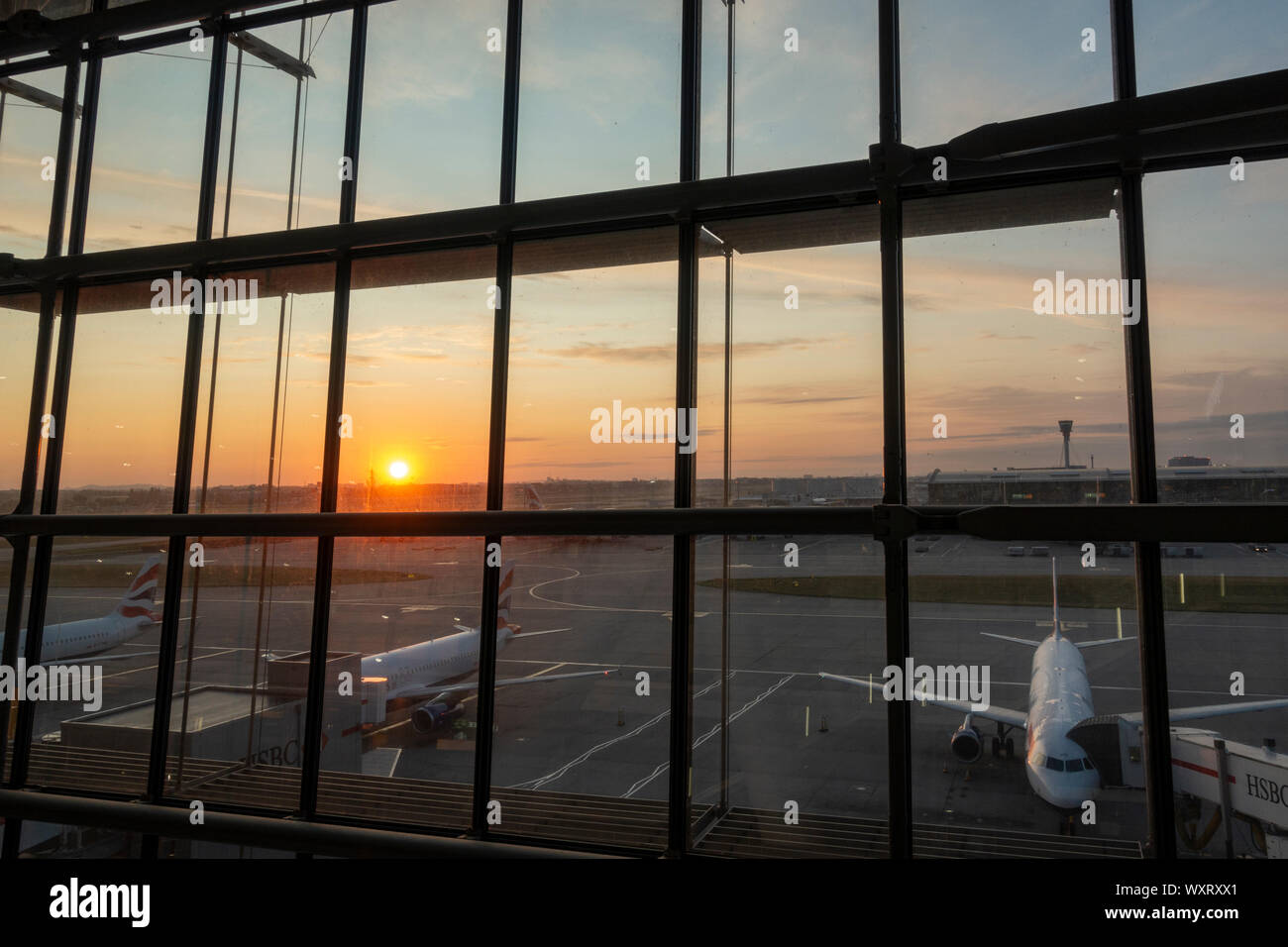 Sunrise viewed through the windows of London Heathrow Terminal 5 ...