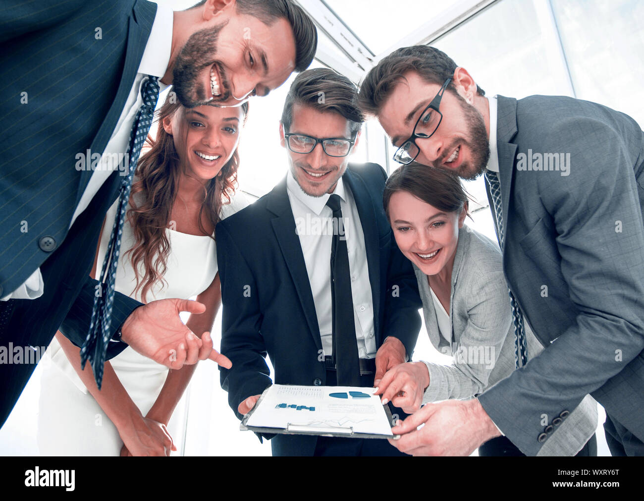 close up.successful business team with financial report Stock Photo - Alamy