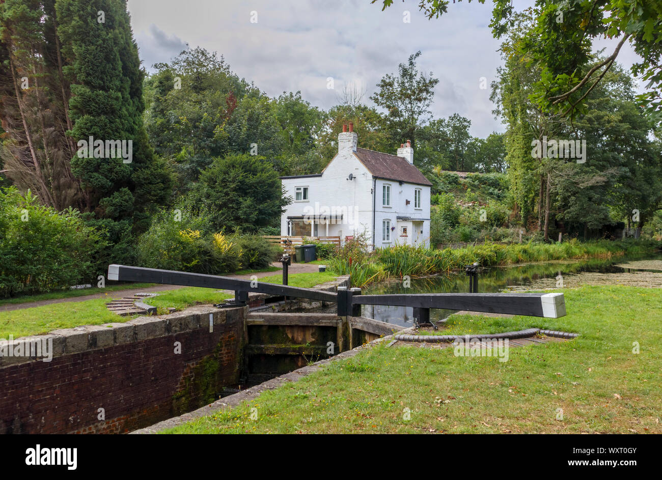 The old lock keeper's cottage and pound lock on the banks of the ...