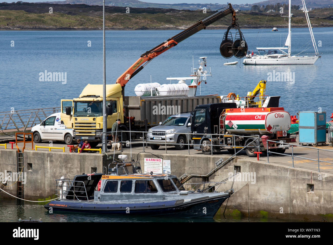 Getting ready to sail, Trawler Baltimore Harbour Stock Photo - Alamy