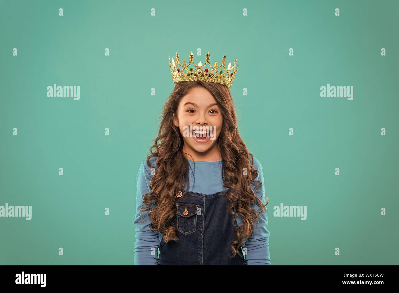 Beauty contest model. Kid wear golden crown symbol of princess. Every ...