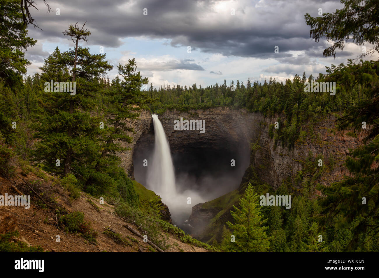Beautiful View of a waterfall, Helmcken Falls, in the Canadian Mountain ...