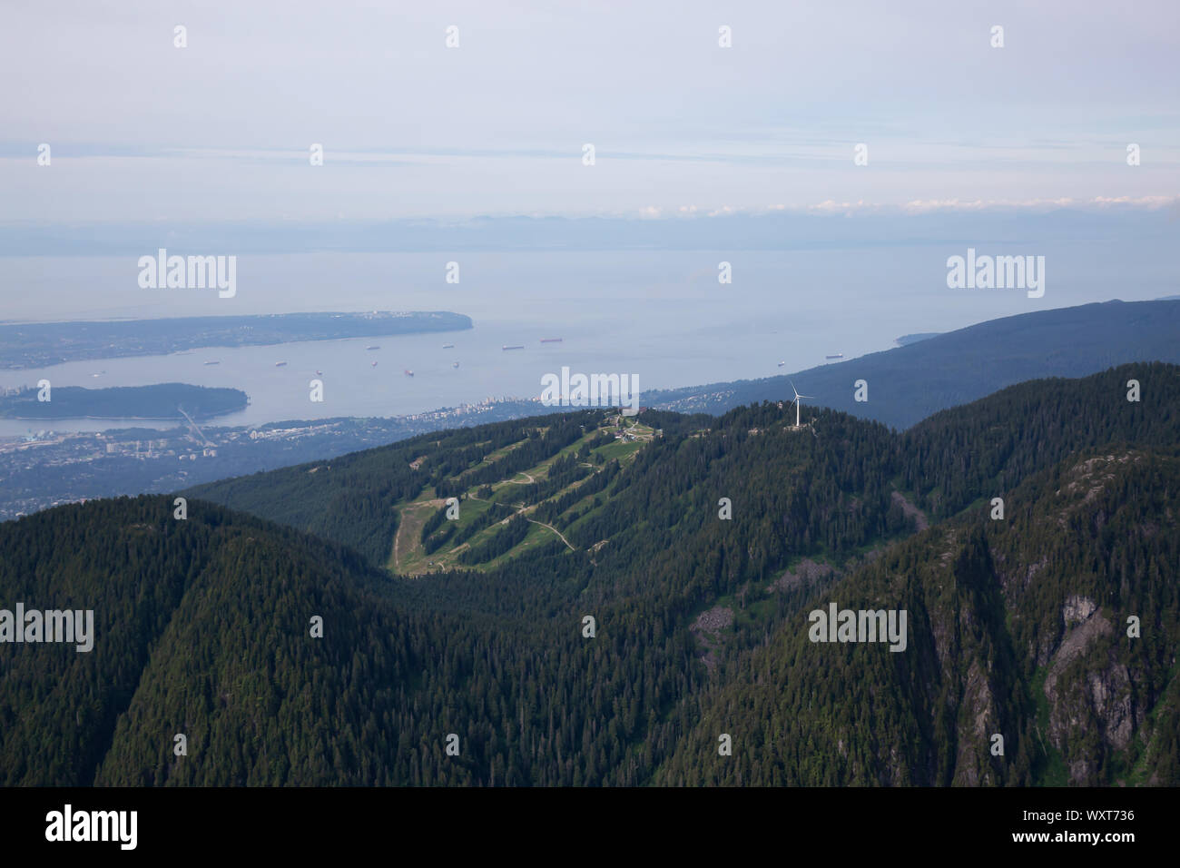 Aerial View of Grouse Mountain with Downtown City in the background ...