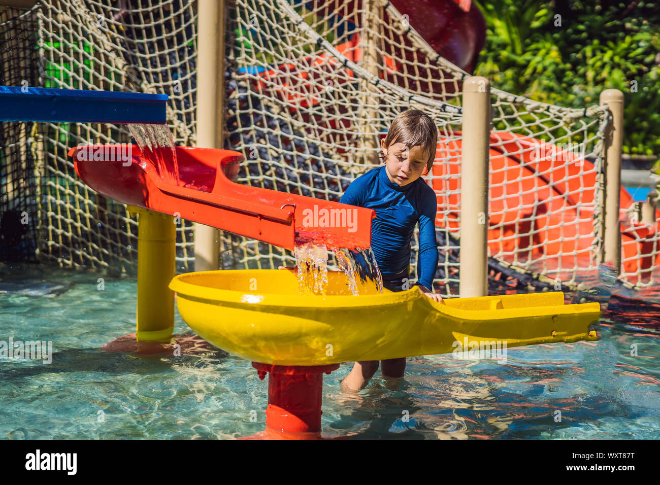 Boy On Water Slide Stock Photos & Boy On Water Slide Stock Images - Alamy