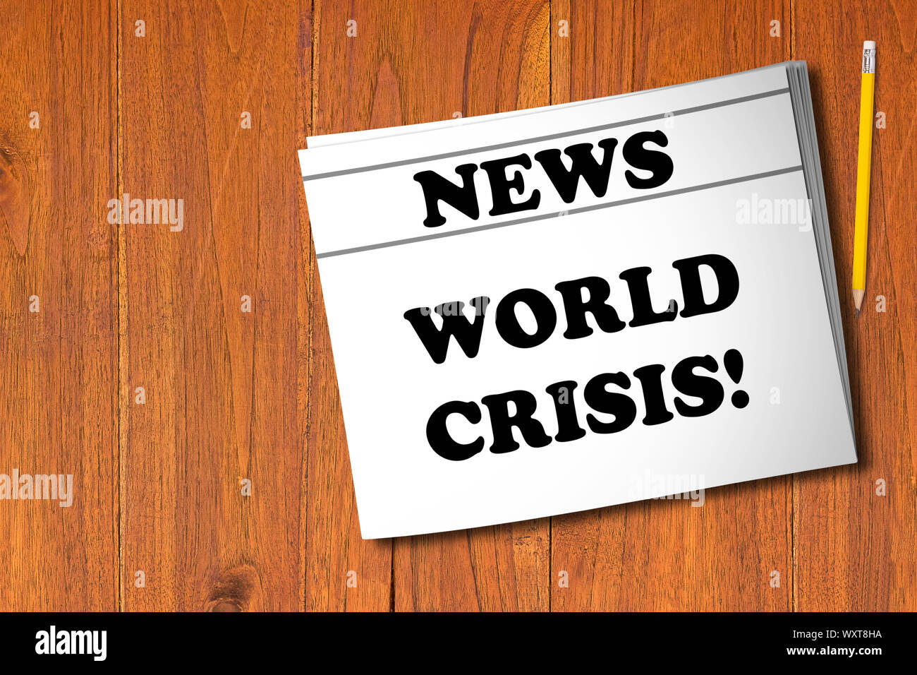 World crisis concept, newspaper and yellow pencil on wooden background ...