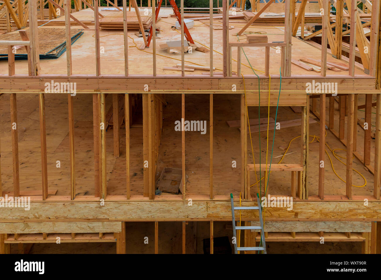 Beam stick built frame of a new house under construction of the wooden ...