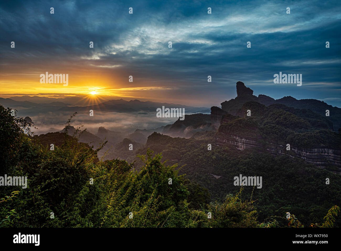 Sunrise at the famous Mount Danxia, Guangdong, China Stock Photo - Alamy