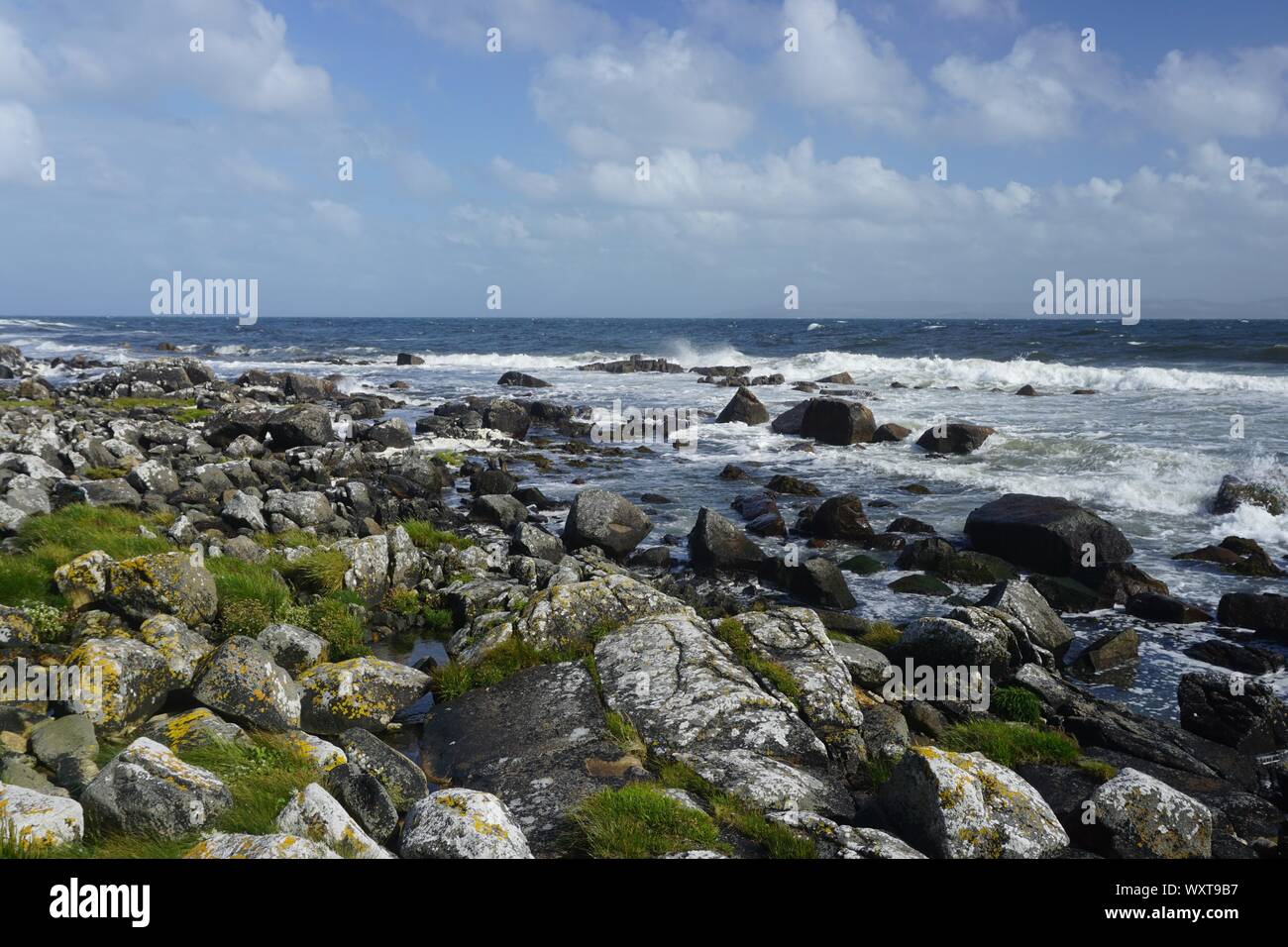 ROCKY SHORE AND SURF OF THE NORTH ATLANTIC, GALWAY, IRELAND Stock Photo ...