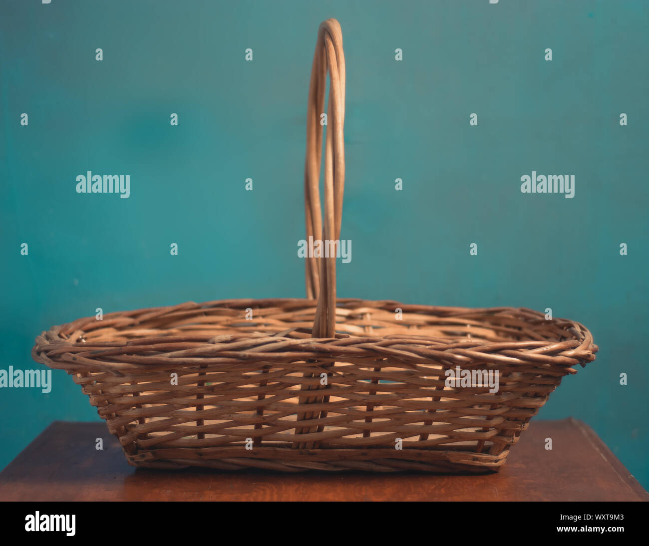 basket on isolated blue background Stock Photo - Alamy