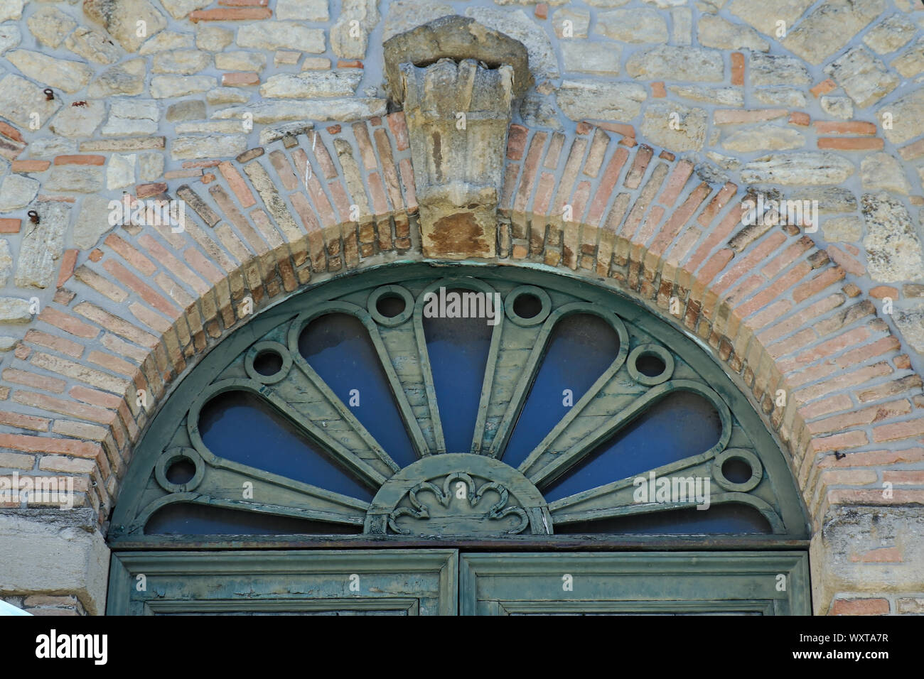 Old architecture arch over the door exterior Stock Photo - Alamy