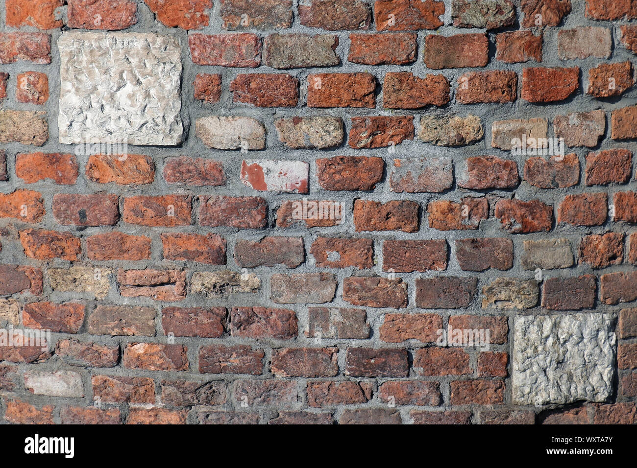 Old faded decayed brick wall pattern background Stock Photo - Alamy