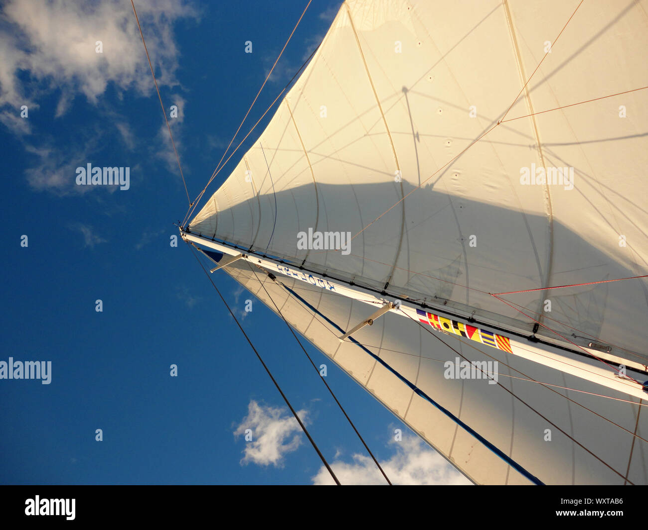 SAILS IN THE WIND Stock Photo - Alamy