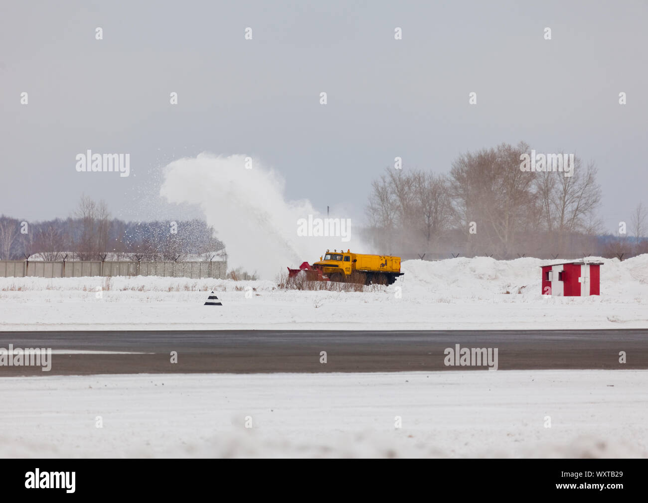 Snow removal tractor cleans hi-res stock photography and images - Alamy