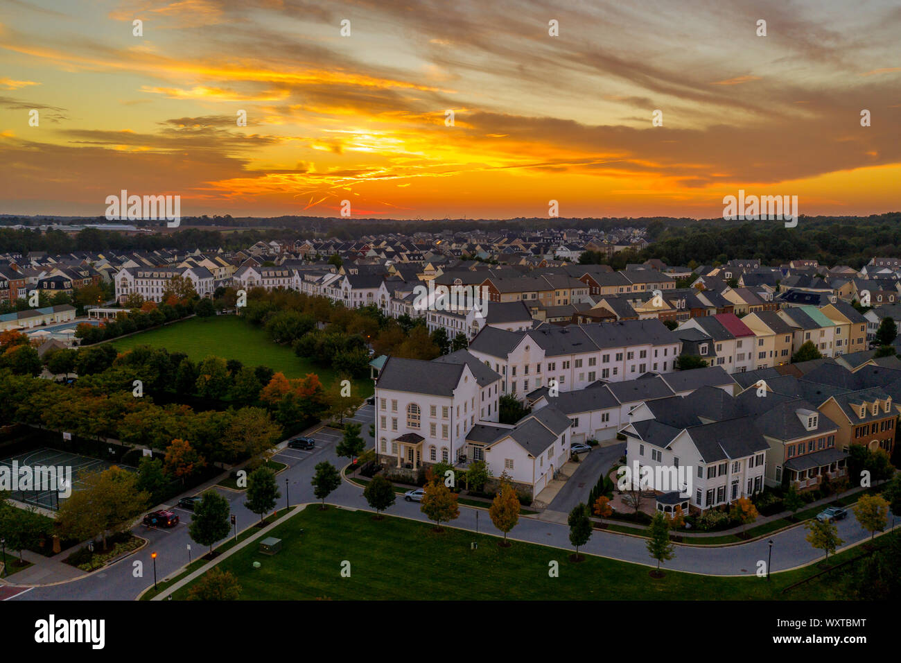 American suburban neighborhood with townhouses and single family homes ...