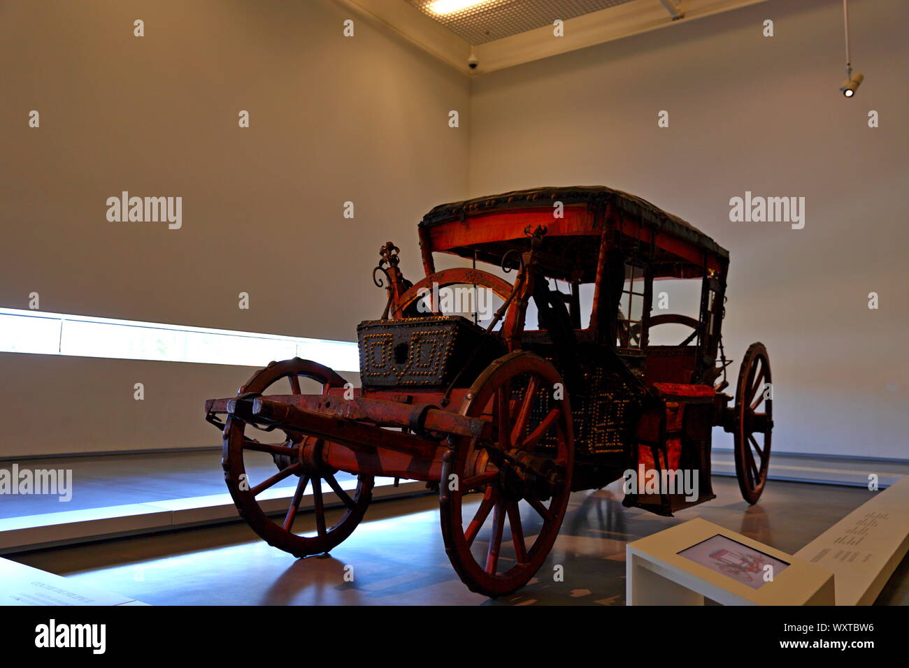 Exhibits of antique carriages in National Coach Museum in Lisbon ...