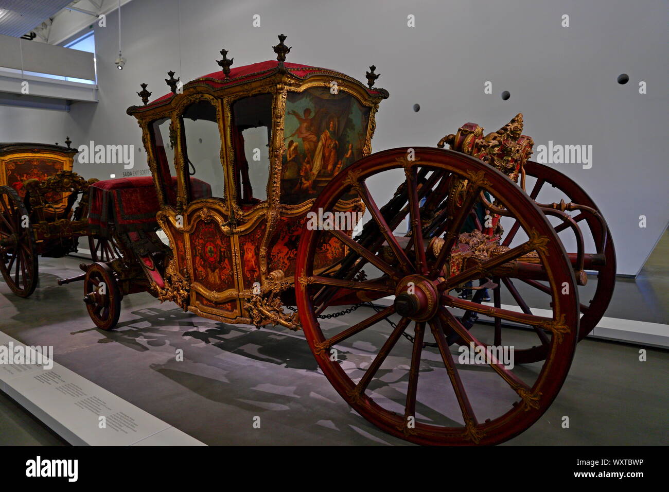 Exhibits of antique carriages in National Coach Museum in Lisbon ...
