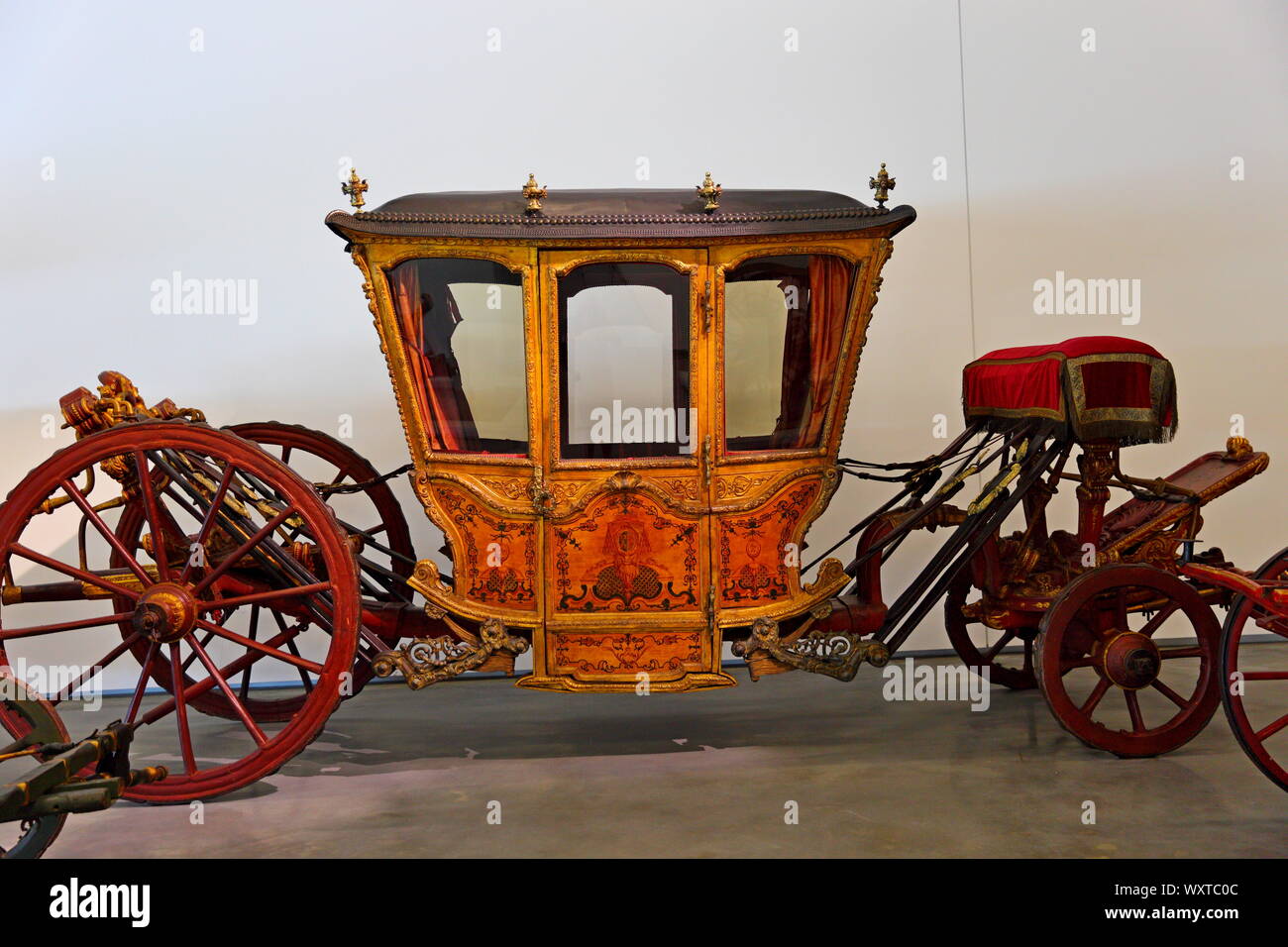 Exhibits of antique carriages in National Coach Museum in Lisbon ...