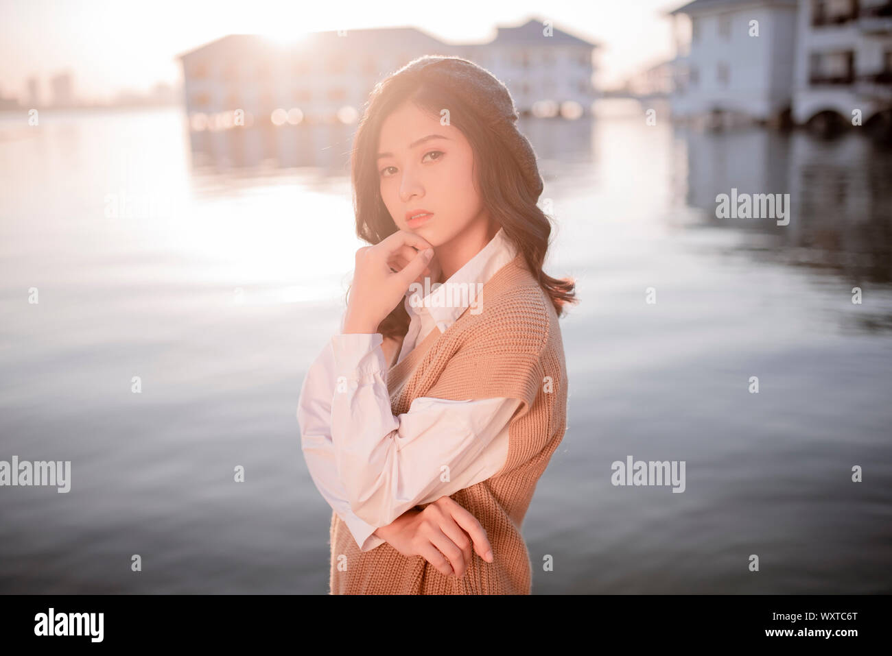 Beautiful girl in white dress, beautiful face in the weather to fall ...