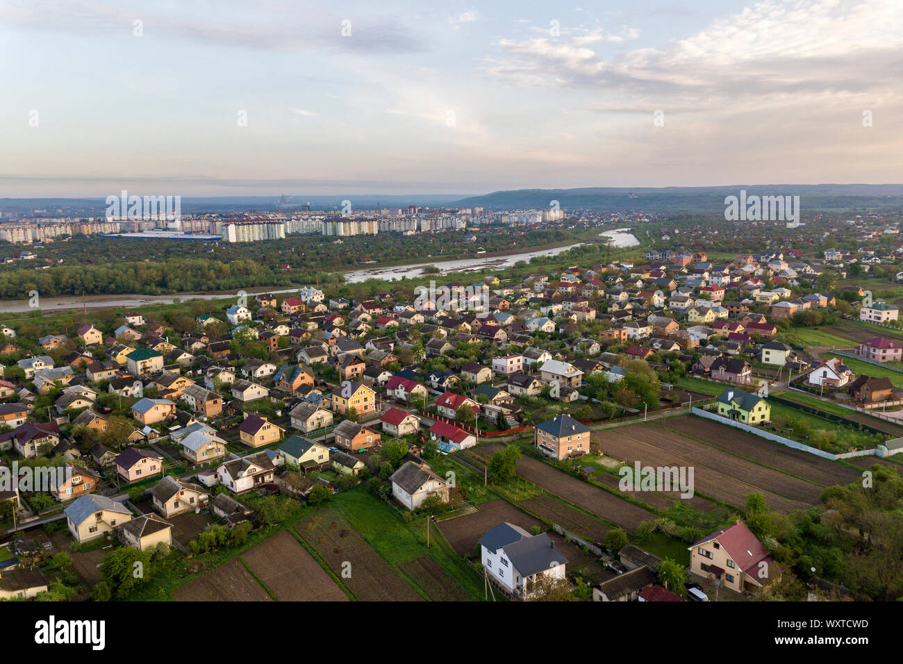 Aerial landscape of small town or village with rows of residential ...
