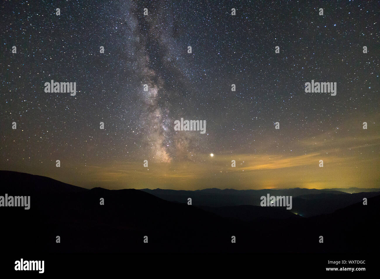 Night landscape of mountains with stars covered sky Stock Photo - Alamy