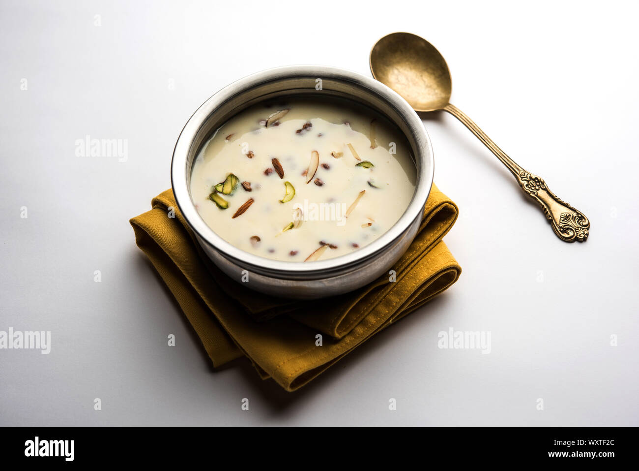 Basundi / Rabri or Rabdi - is a dessert made of condensed milk and dry ...