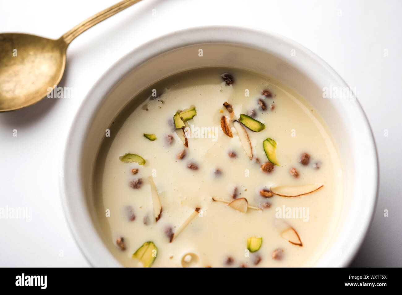 Basundi / Rabri or Rabdi - is a dessert made of condensed milk and dry ...