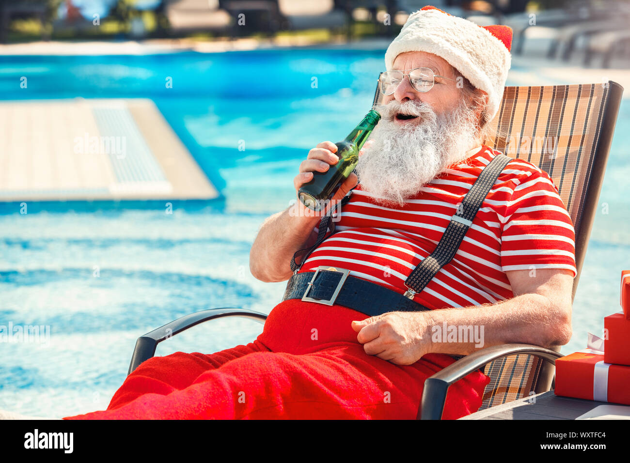 Santa Claus near the pool holiday vacation concept Stock Photo - Alamy