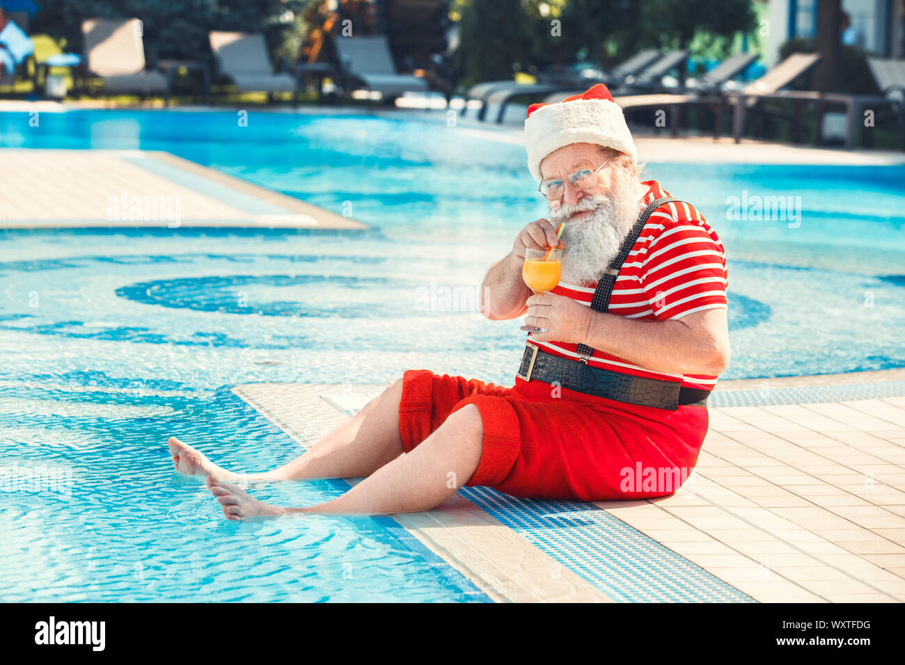 Santa Claus near the pool holiday vacation concept Stock Photo - Alamy