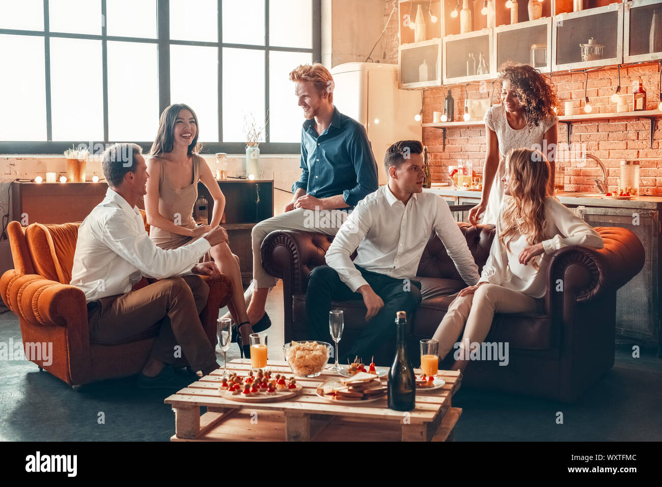 Male female talking party hi-res stock photography and images - Alamy