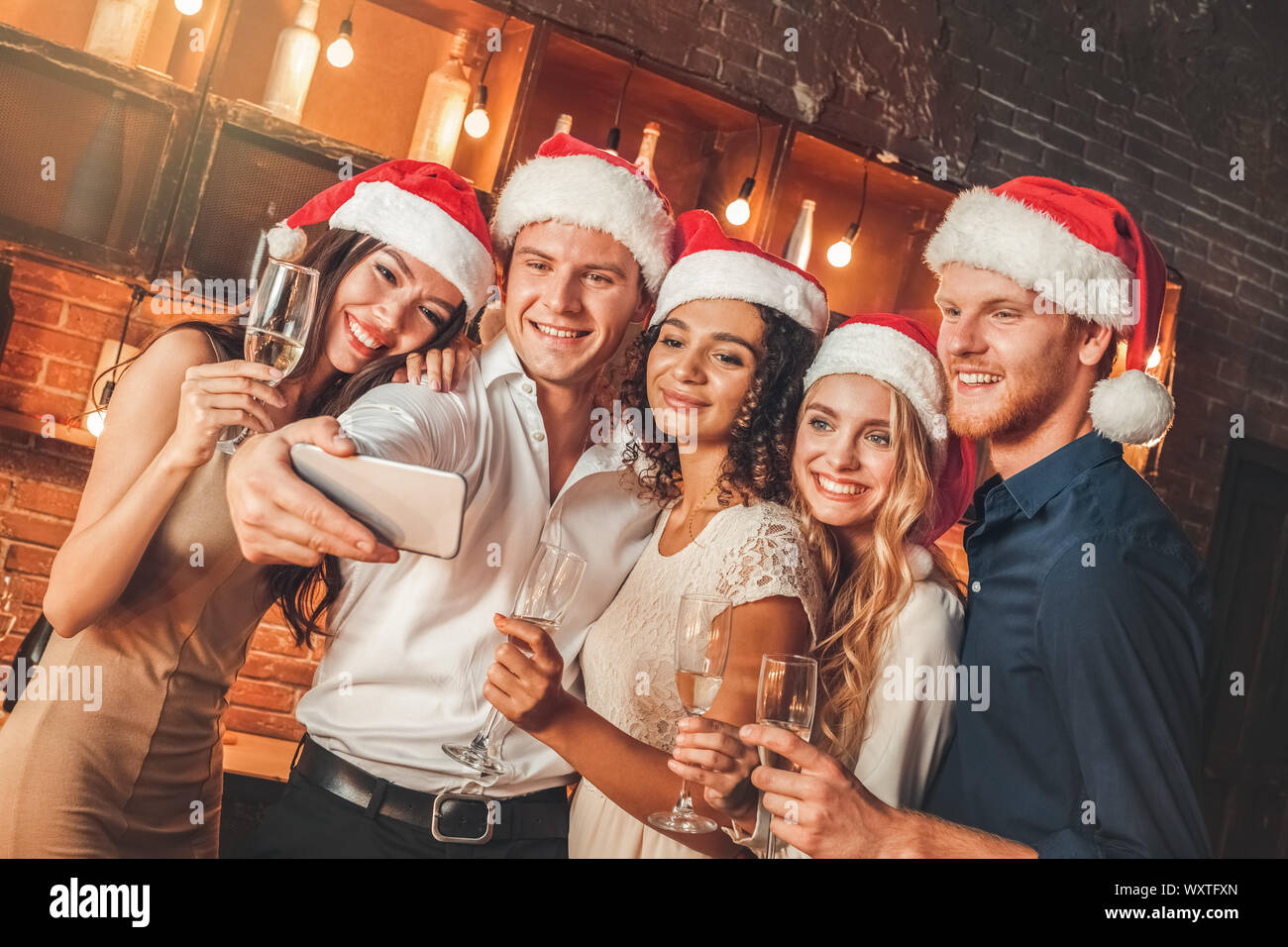 Group friends gathering indoors hi-res stock photography and images - Alamy