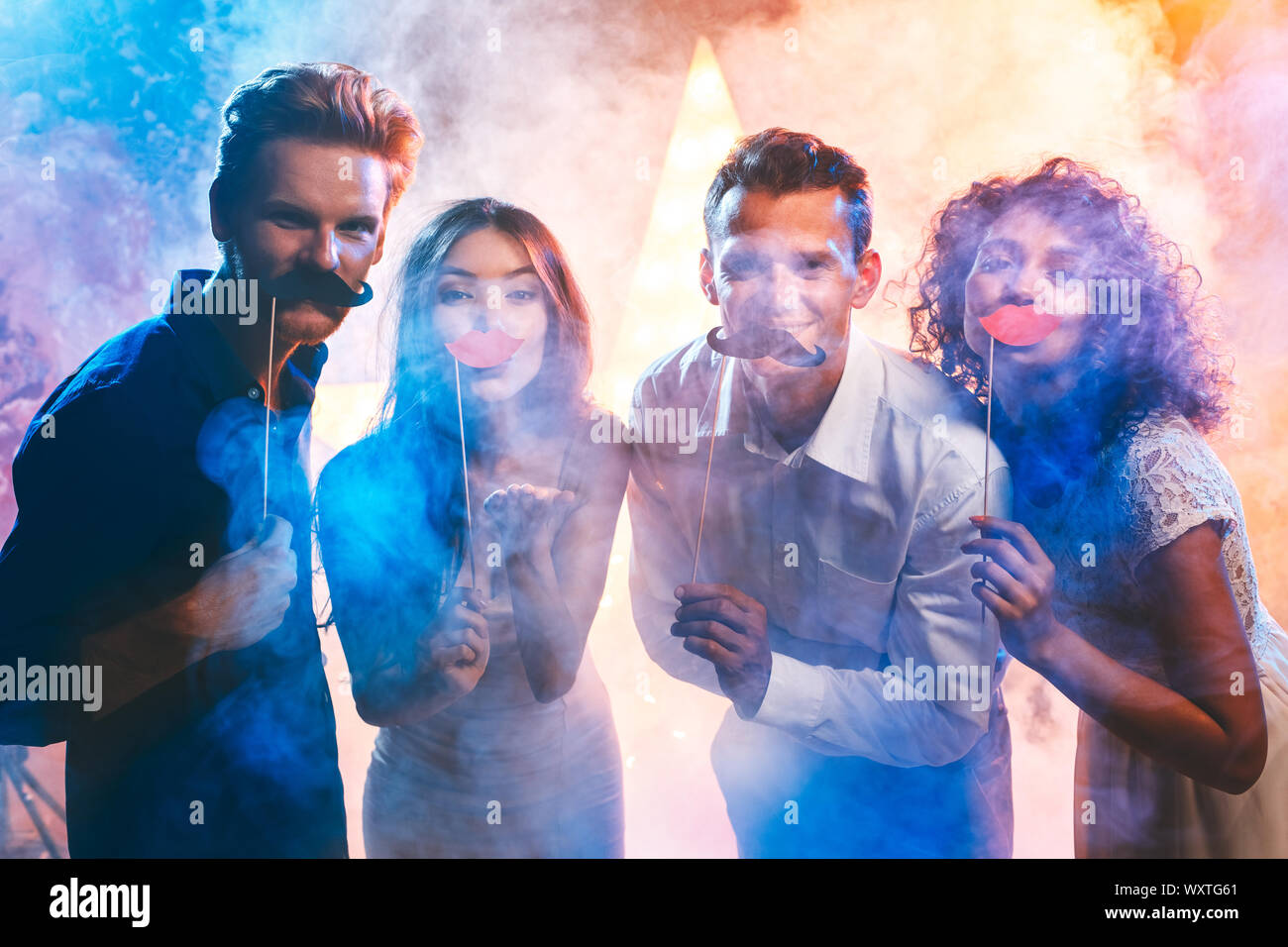 Group of friends party together indoors celebration Stock Photo - Alamy