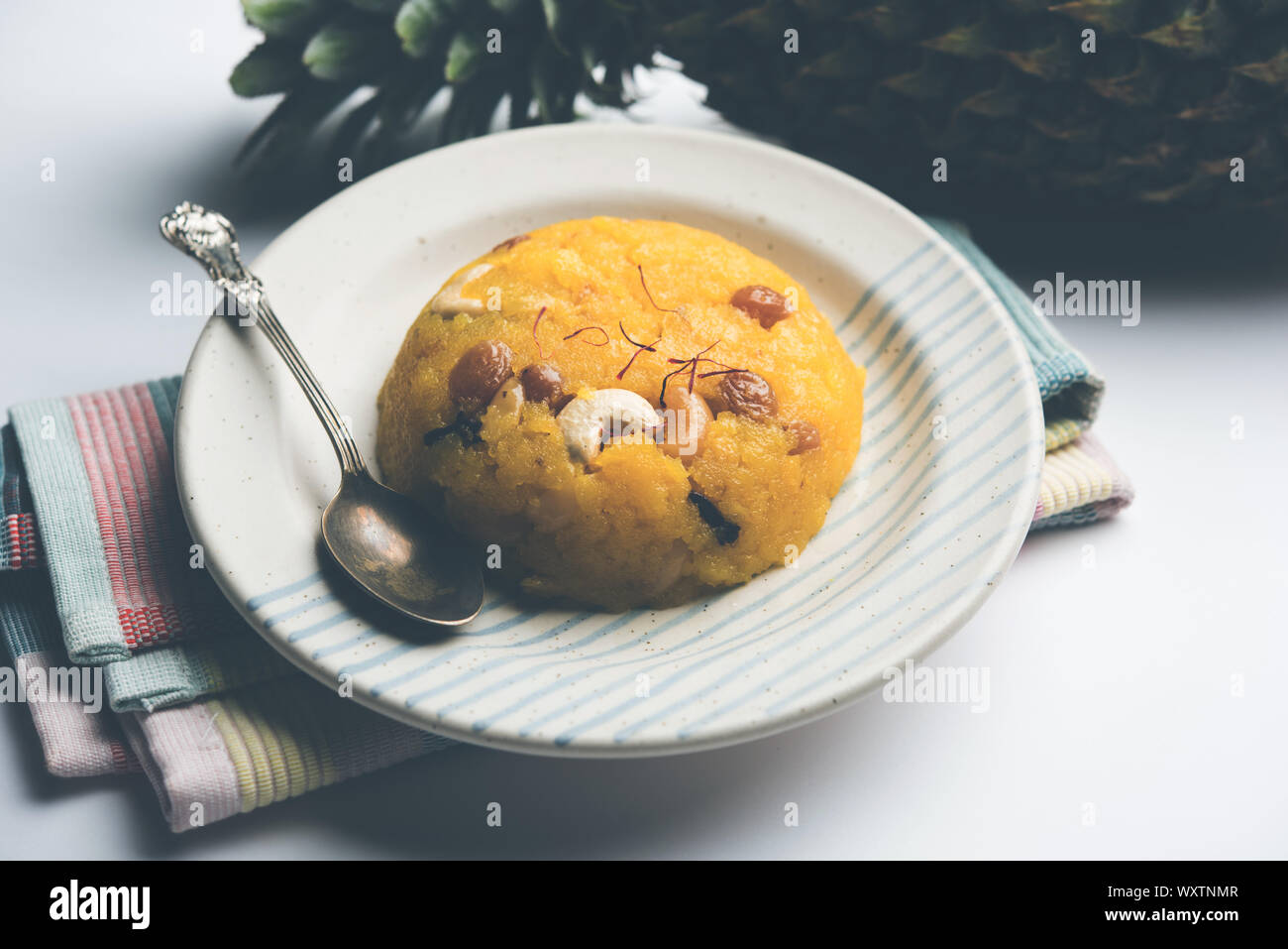 Pineapple sheera or Halwa also known as Ananas keshri shira. Popular ...