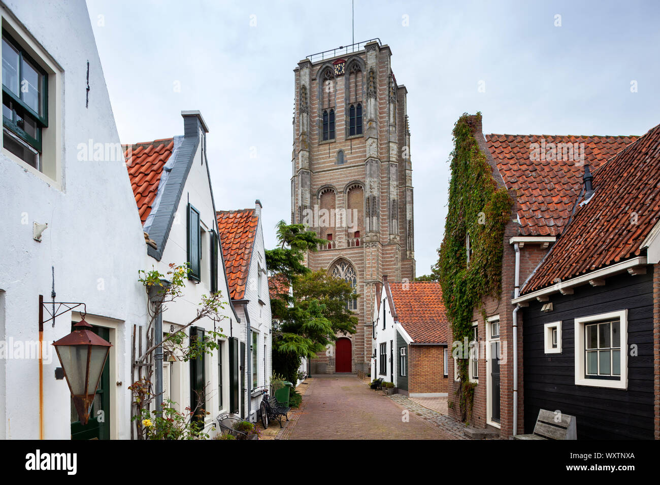 Historical street and church in Goedereede in the Netherlands Stock ...