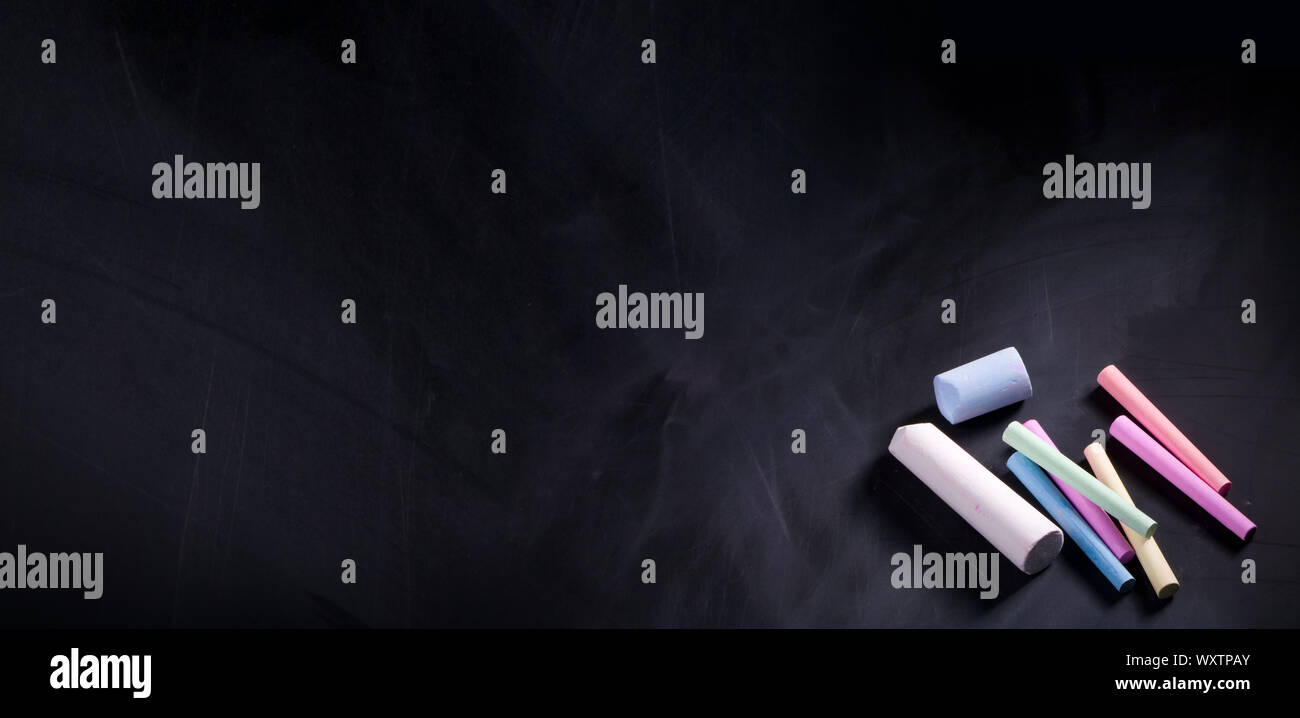 blackboard with colored chalks Horizontal composition. space for text ...