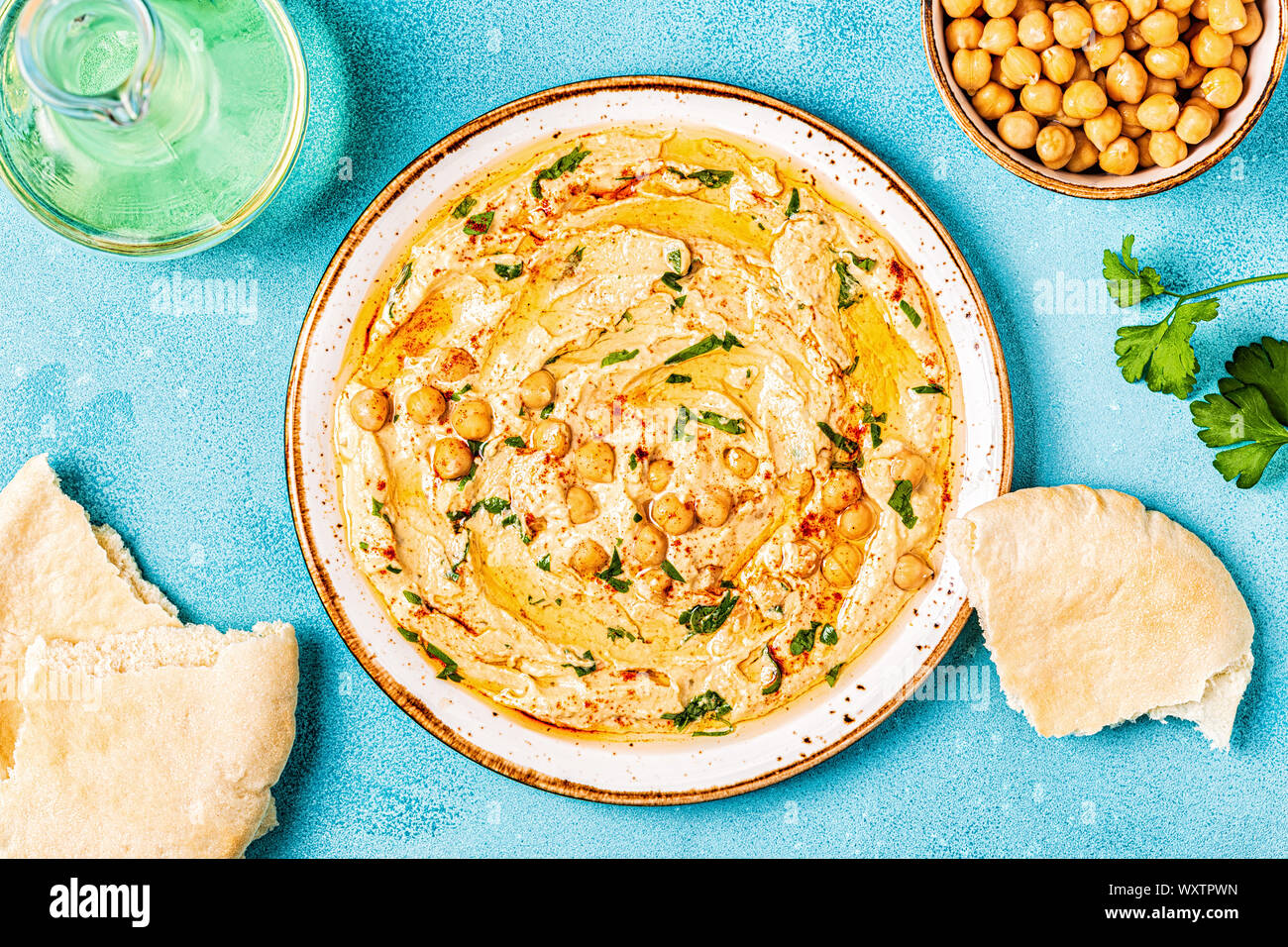 Homemade hummus, chickpea dip, with spices. Top view Stock Photo - Alamy