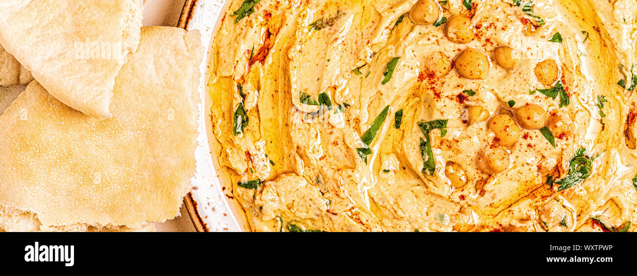 Homemade hummus, chickpea dip, with spices. Top view Stock Photo - Alamy