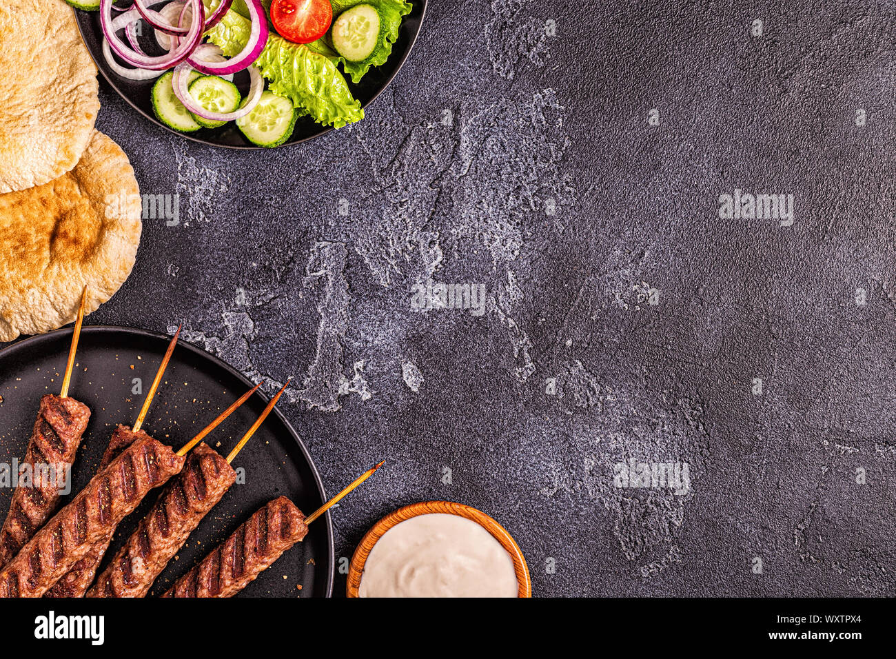 Traditional middle eastern, arabic or mediterranean meat kebab with ...