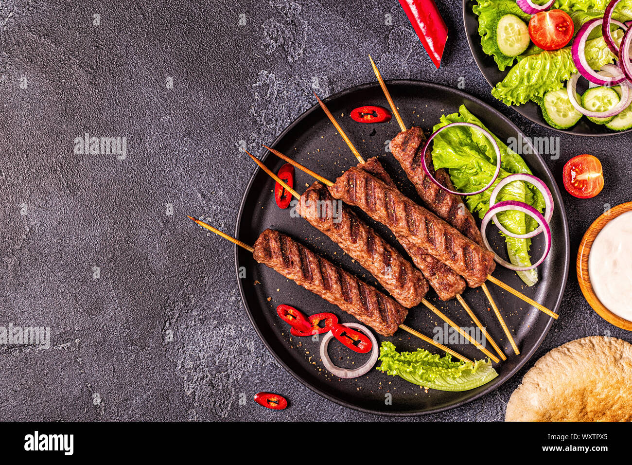 Traditional middle eastern, arabic or mediterranean meat kebab with ...