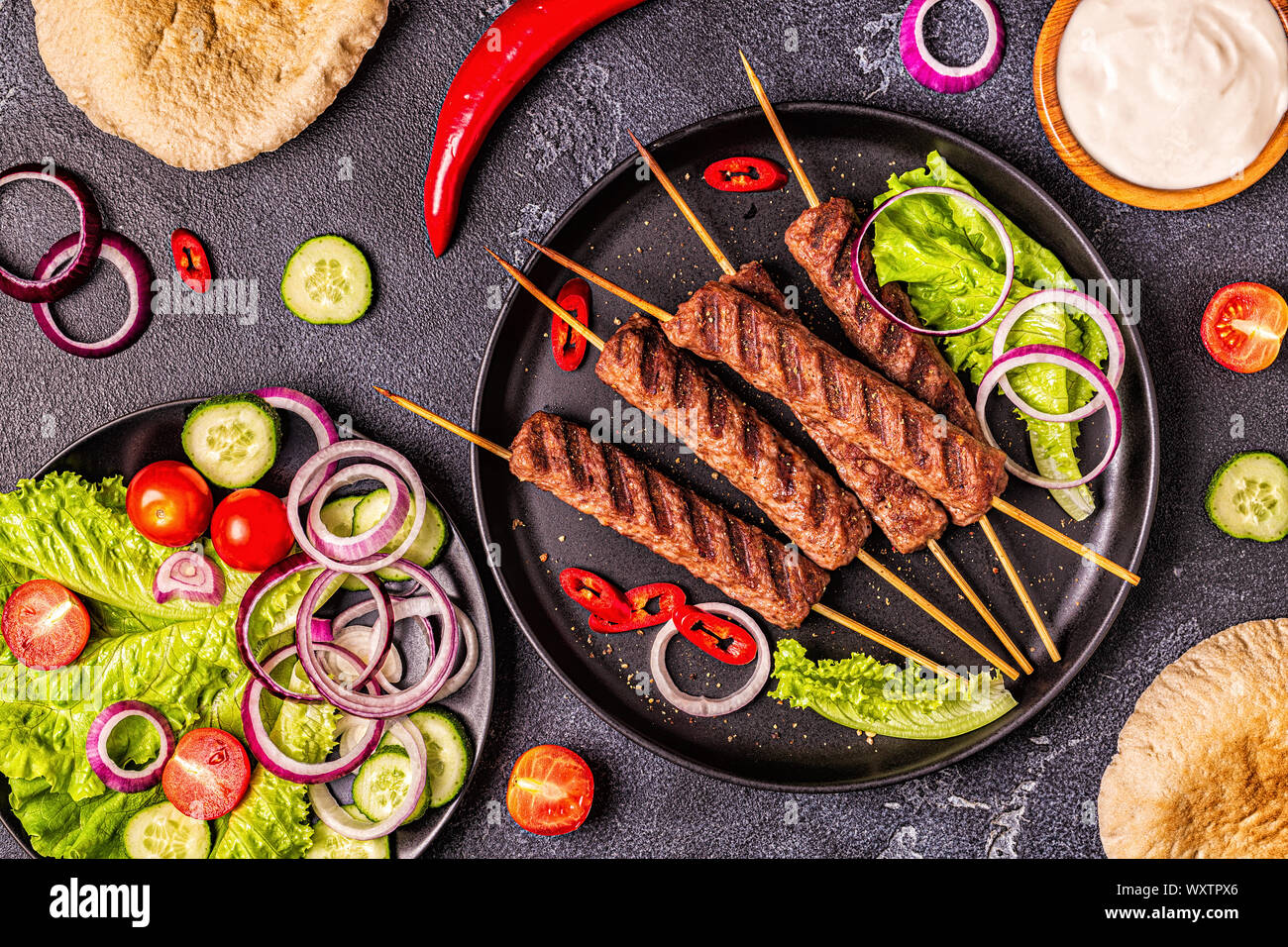 Traditional middle eastern, arabic or mediterranean meat kebab with ...