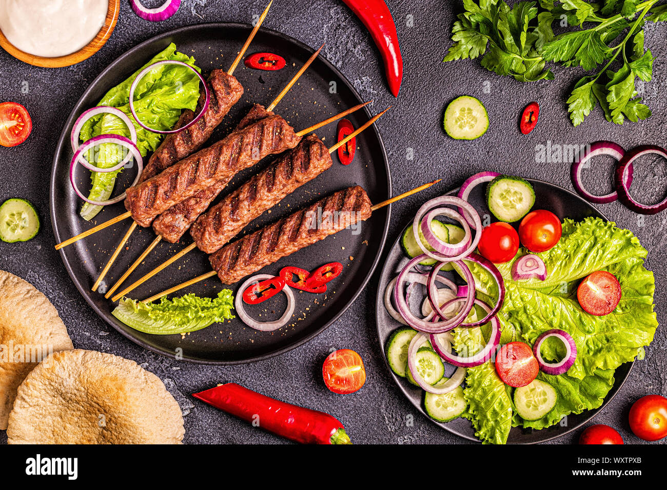 Traditional middle eastern, arabic or mediterranean meat kebab with ...