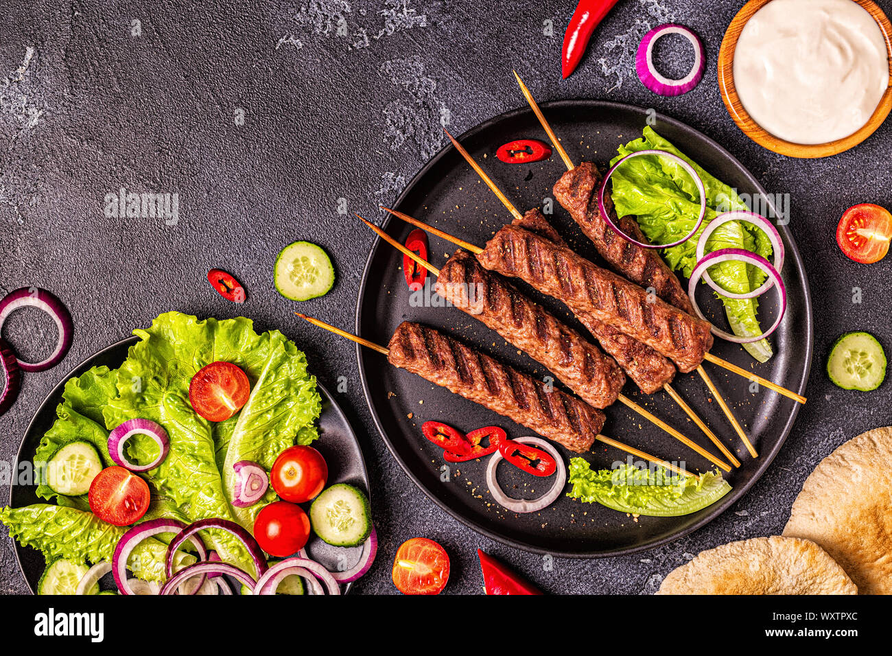 Traditional middle eastern, arabic or mediterranean meat kebab with ...