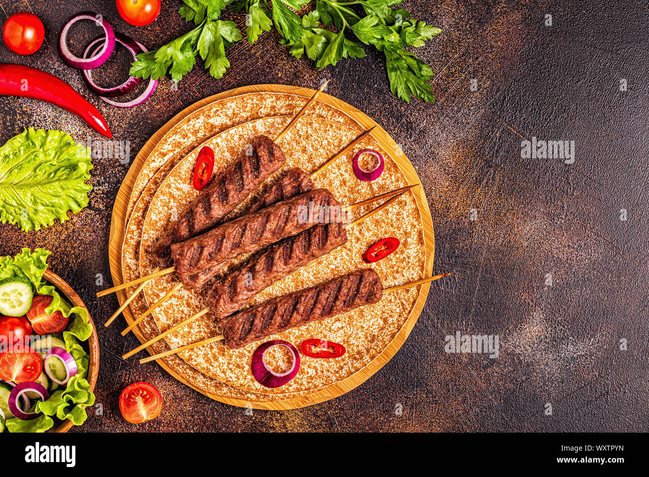 Traditional middle eastern, arabic or mediterranean meat kebab with ...