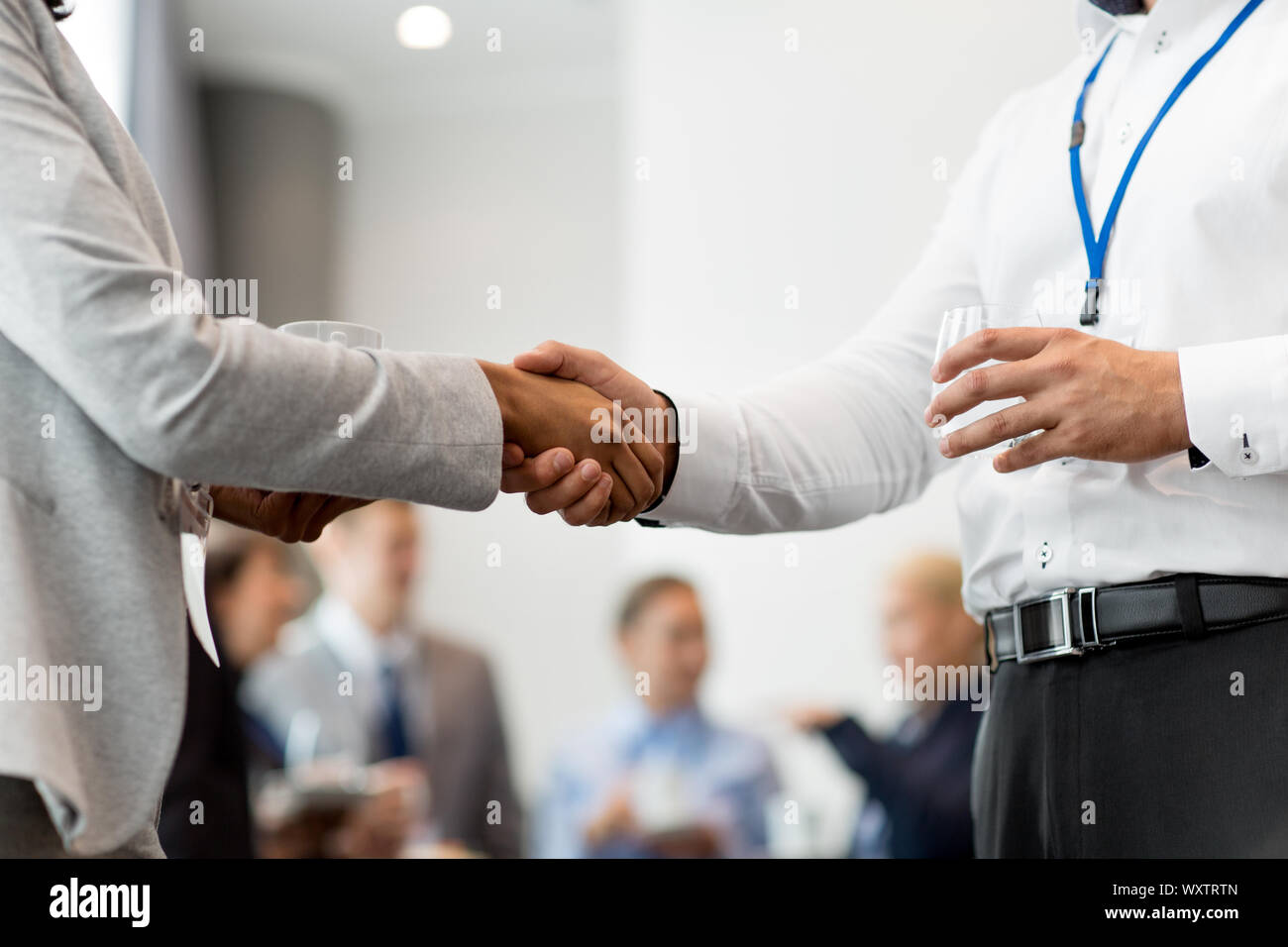 business, partnership and cooperation concept - handshake of people at ...