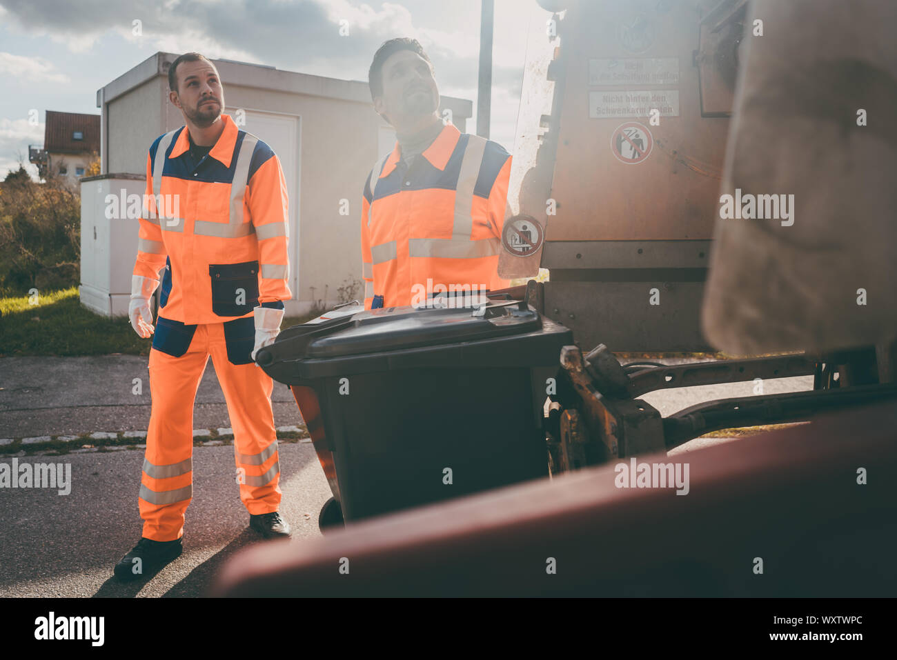 Emptying trash hi-res stock photography and images - Alamy