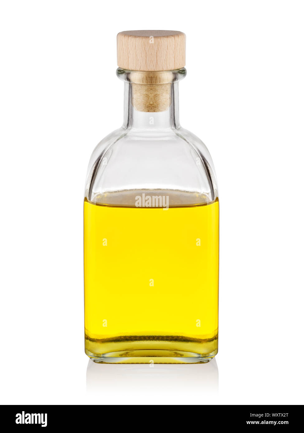 Bottle of yellow oil isolated on white background Stock Photo - Alamy