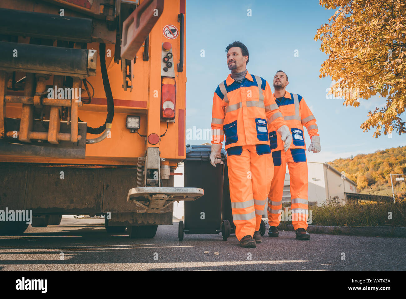 Emptying trash hi-res stock photography and images - Alamy
