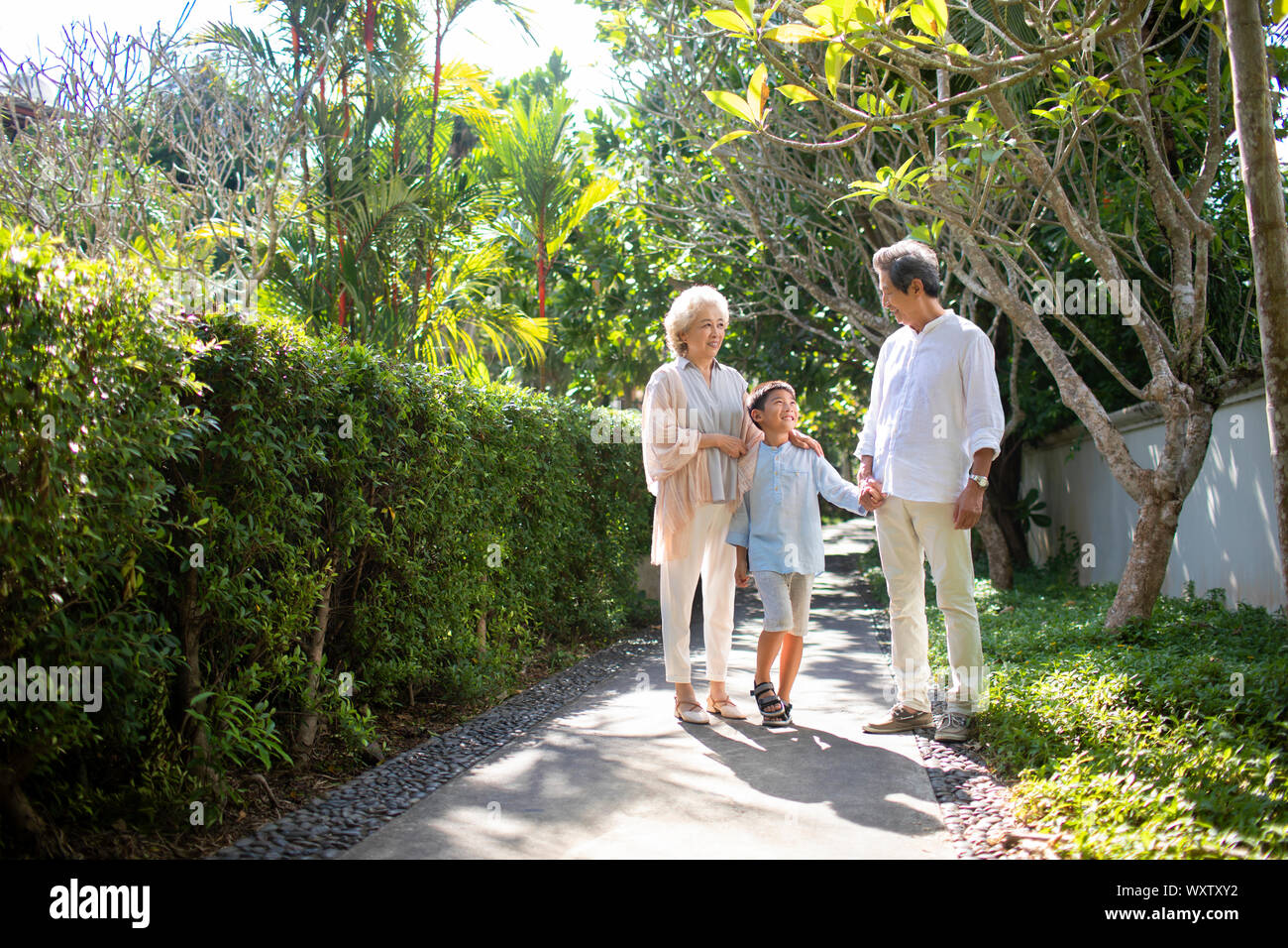 Grandparent and grandson having fun Stock Photo - Alamy