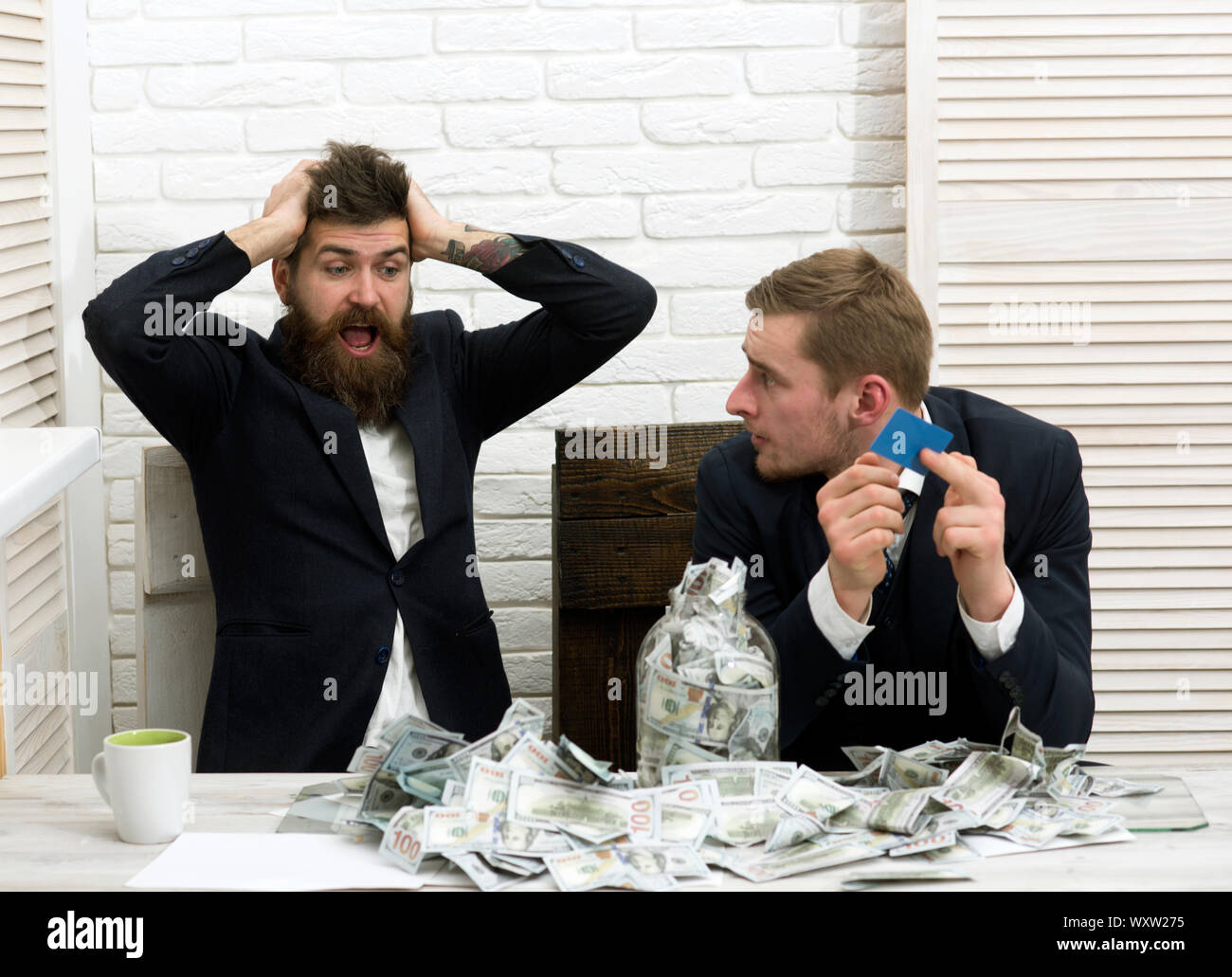 Business partners, businessmen at meeting in office. Bearded boss ...